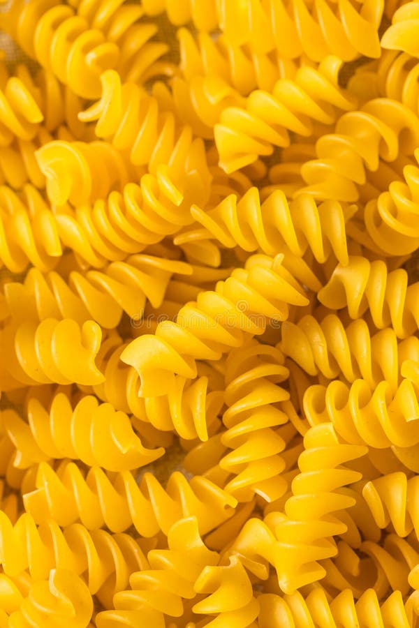 Dry Yellow Organic Rotini Pasta Stock Photo - Image of dinner, organic ...