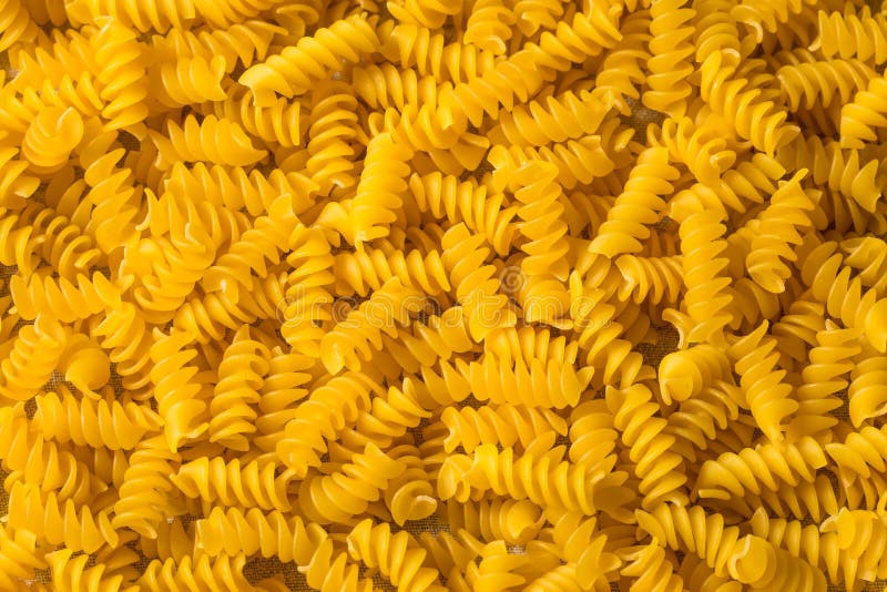 Dry Yellow Organic Rotini Pasta Stock Photo - Image of wheat, pasta ...