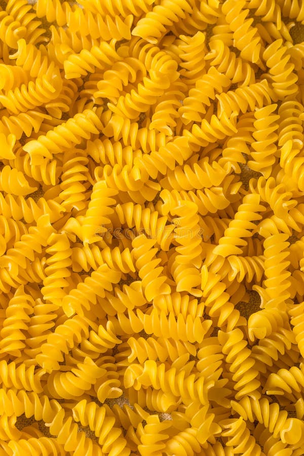 Dry Yellow Organic Rotini Pasta Stock Photo - Image of yellow, gourmet ...