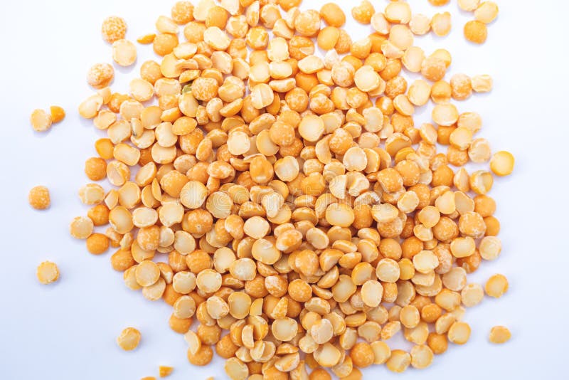 Dry yellow peas on a white stock image. Image of nutrition - 159028041