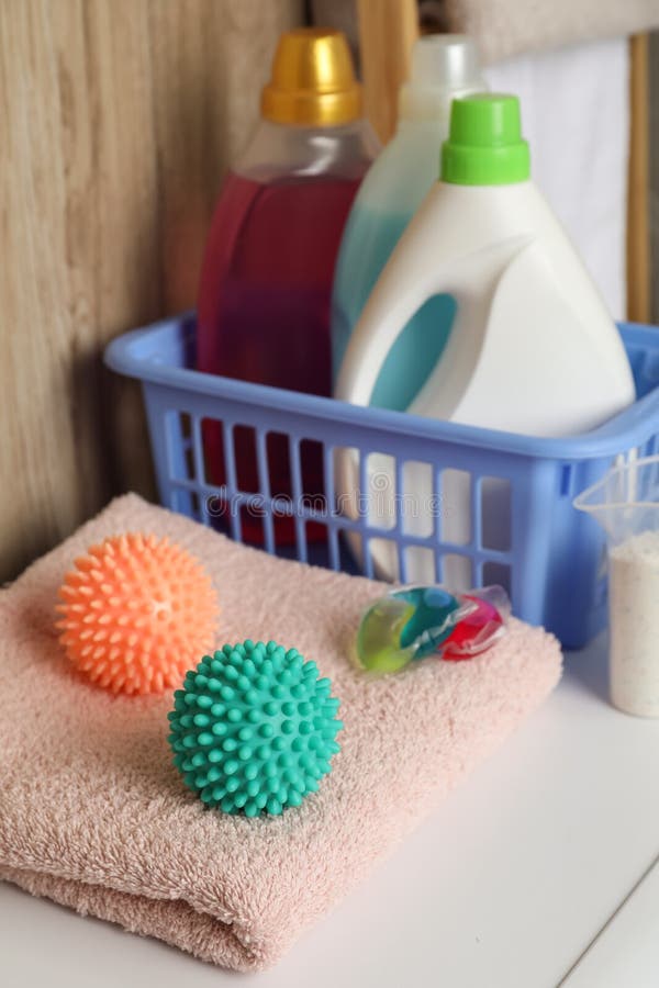 Dryer Balls, Detergents and Clean Towel on Washing Machine Stock Image ...