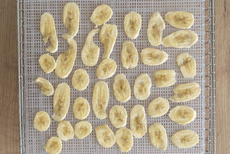 Drying bananas on a grid stock image. Image of freshness - 266430795