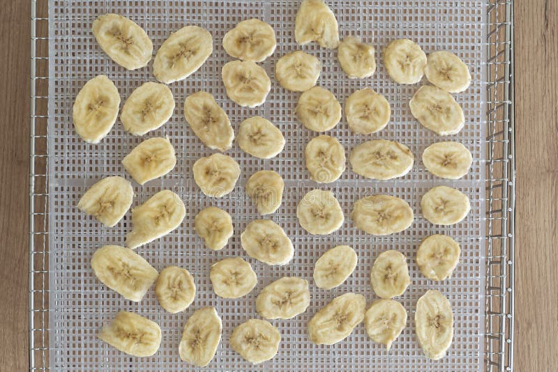 Drying bananas on a grid stock photo. Image of organic - 266430802