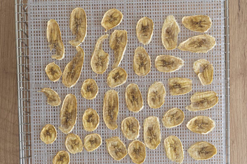 Drying bananas on a grid stock photo. Image of healthy - 266430810