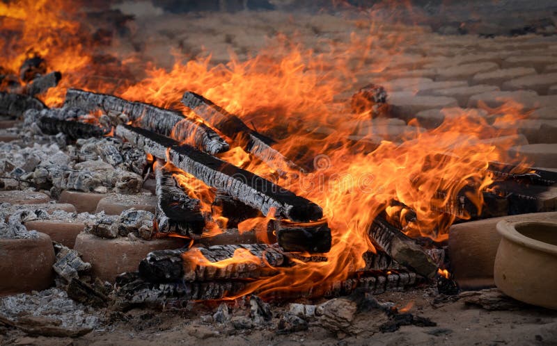 Drying clay pots on fire stock photo. Image of people - 193167052