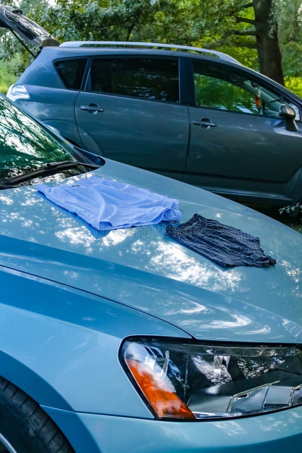 Drying clothes on a car stock image. Image of bumper - 368009089