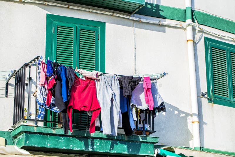 Drying Clothes Hanging on the Balcony of the Old Building Stock Image ...