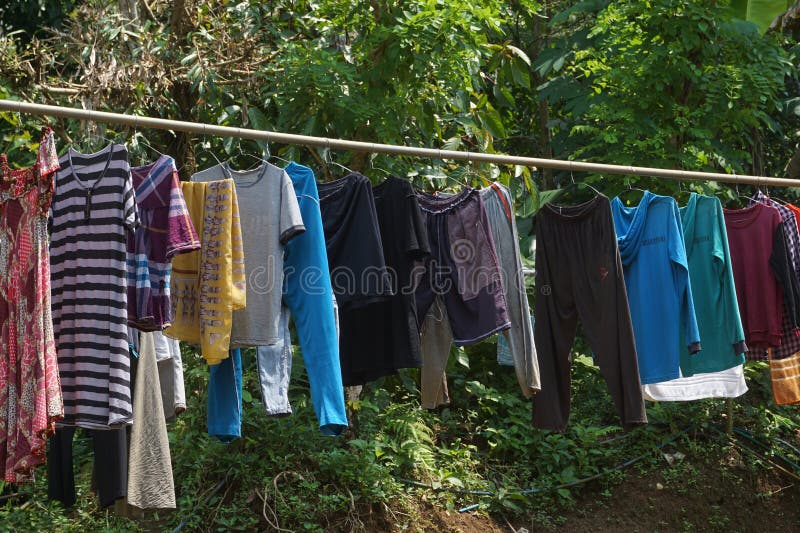 Drying Clothes that Have Been Washed Manually Using the Sun Stock Image ...