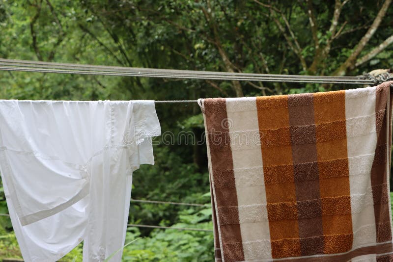 Drying Clothes on Line in Backyard Stock Image - Image of clothespin ...