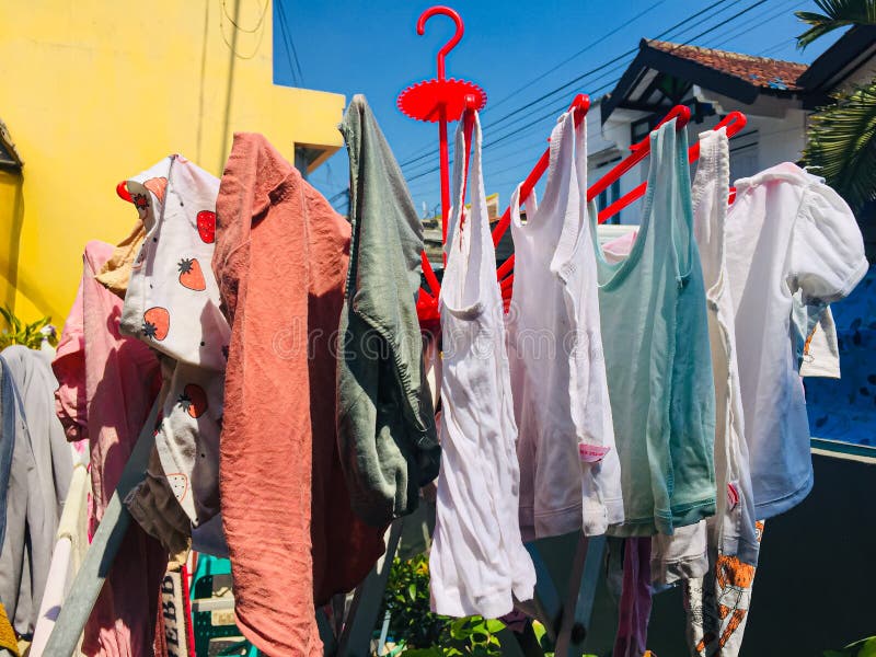 Drying Clothes when the Sun is Hot Stock Image - Image of drying, green ...
