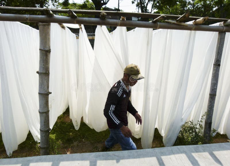 Drying fabric editorial photography. Image of people - 77297532