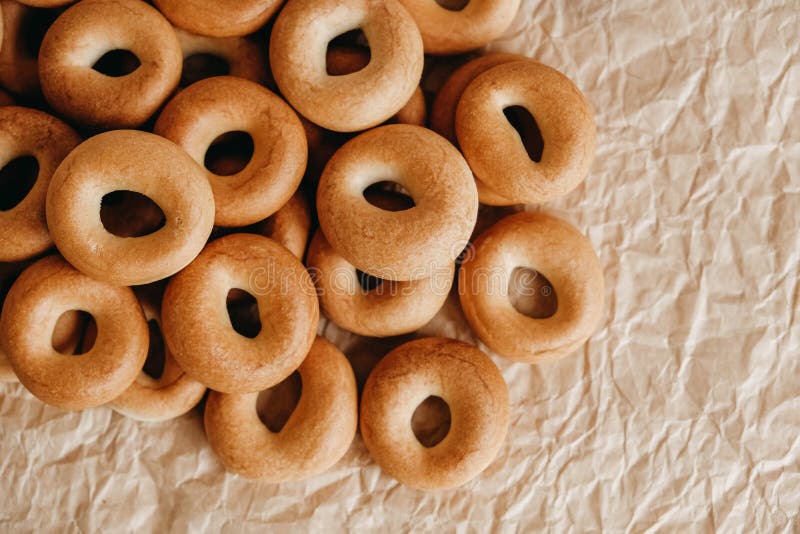 Drying or Mini Round Bagels on Kraft Paper Background. Top View. Copy ...