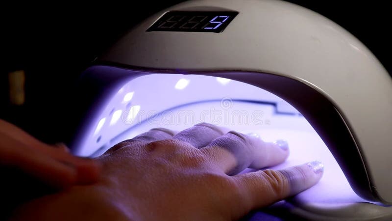 Drying Nails in the Uv Lamp Nail Dryer Machine Stock Video - Video of ...