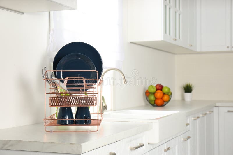 Drying Rack with Dishes on Countertop in Kitchen. Space for Text Stock ...