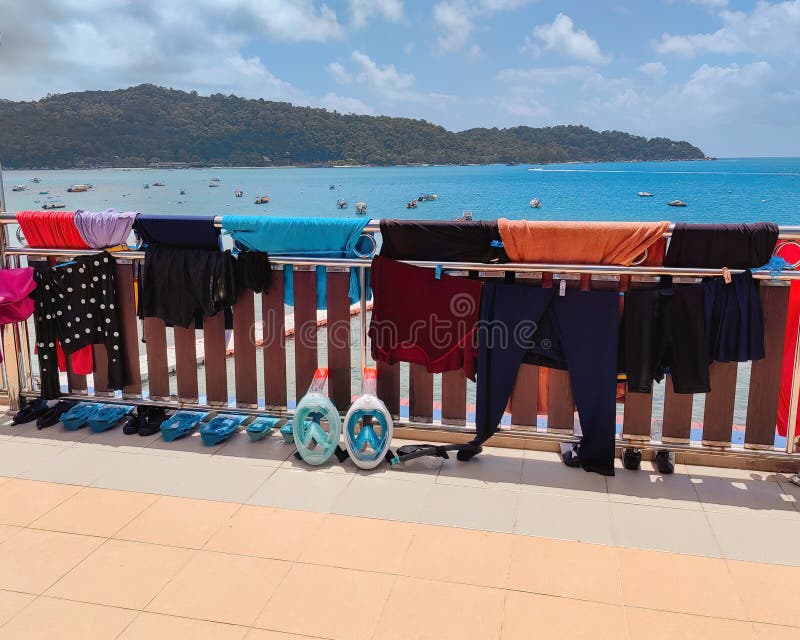 Drying Swimming Clothes on the Rail at the Resort by the Beach Stock ...