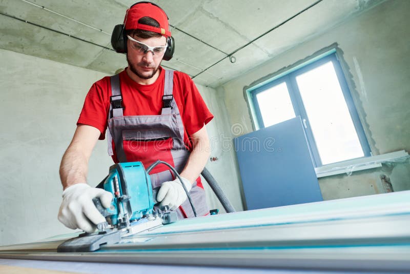 Drywall Construction at Home. Contractor Worker Milling Gypsum ...