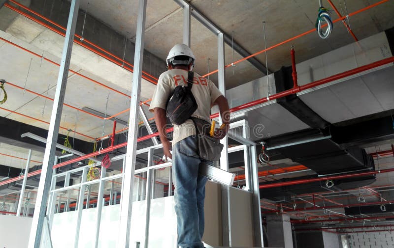 Drywall Installation Work in Progress by Construction Workers at the ...