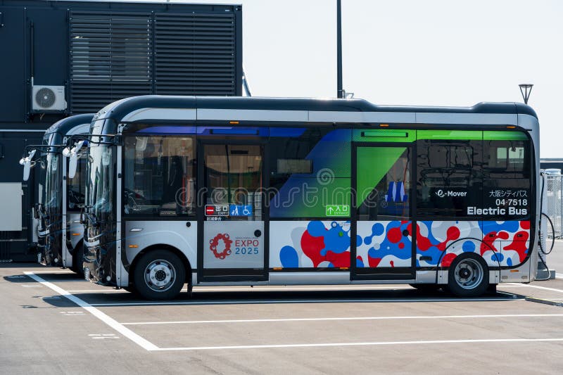 The E-mover EV Shuttle Bus in Motion, Transporting Visitors within the ...