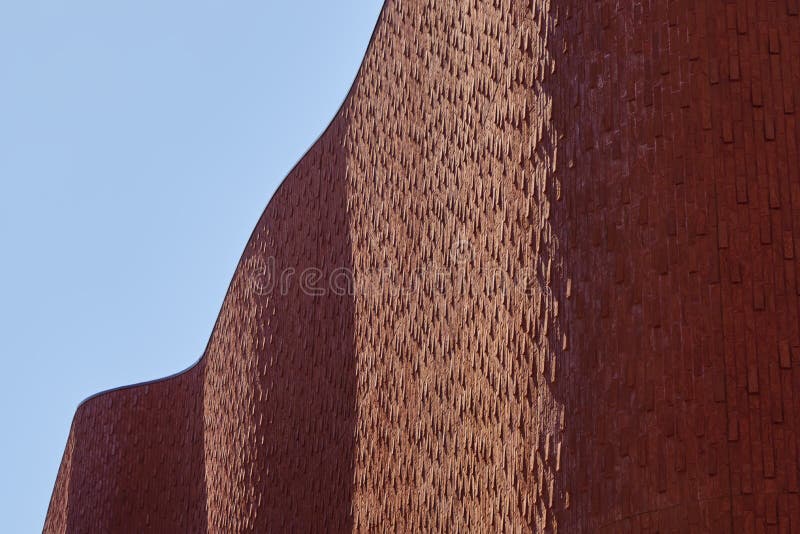 Red Brown Wavy Brick Wall of a Modern Building Stock Photo - Image of ...