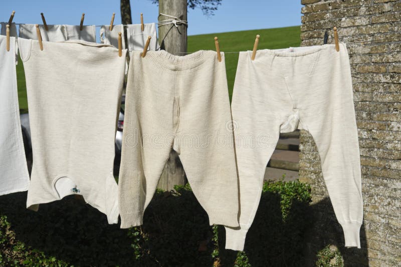 Old-fashioned Knitted Long Woolen Underwear on a Line Stock Image ...