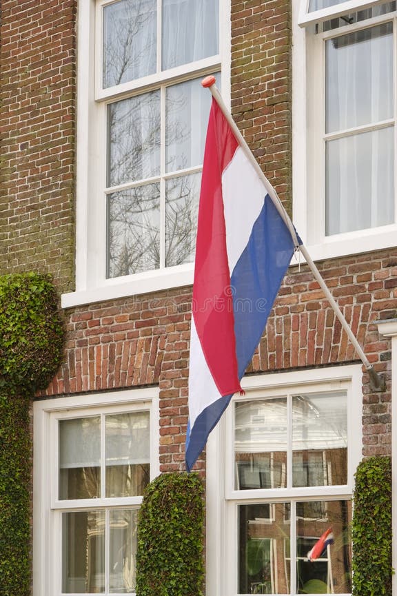 Dutch Flags Waving in a Dutch Street on Koningsdag Stock Image - Image ...