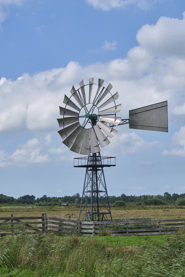 An American Wind Engine Against a Blue Sky Stock Photo - Image of ...