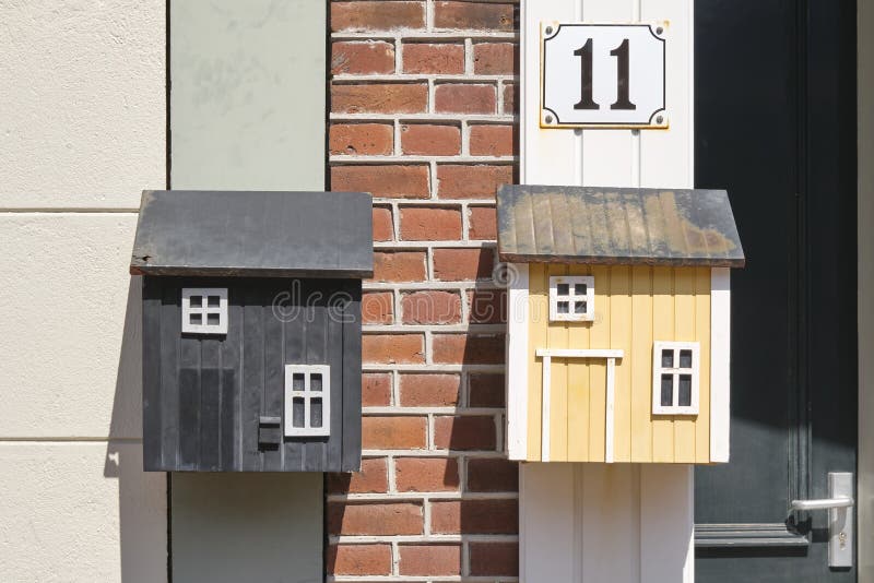 Two Mailboxes in the Shape of a House Stock Photo - Image of closeup ...
