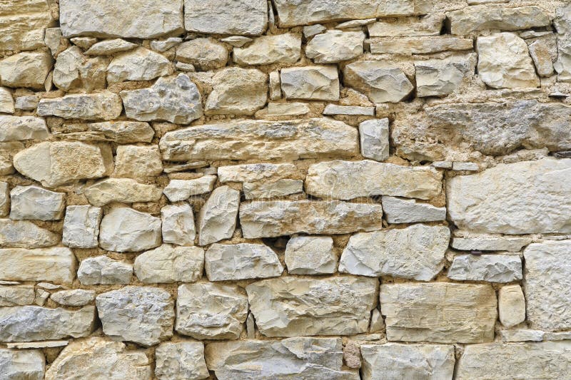 Background of a Natural Stone Masonry Wall in South France Stock Photo ...