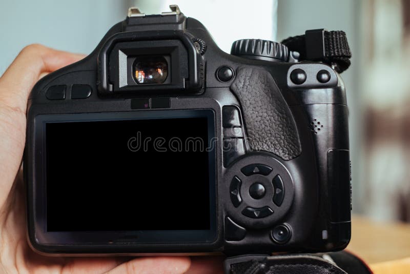 DSLR camera on human hands stock image. Image of focus - 94438501