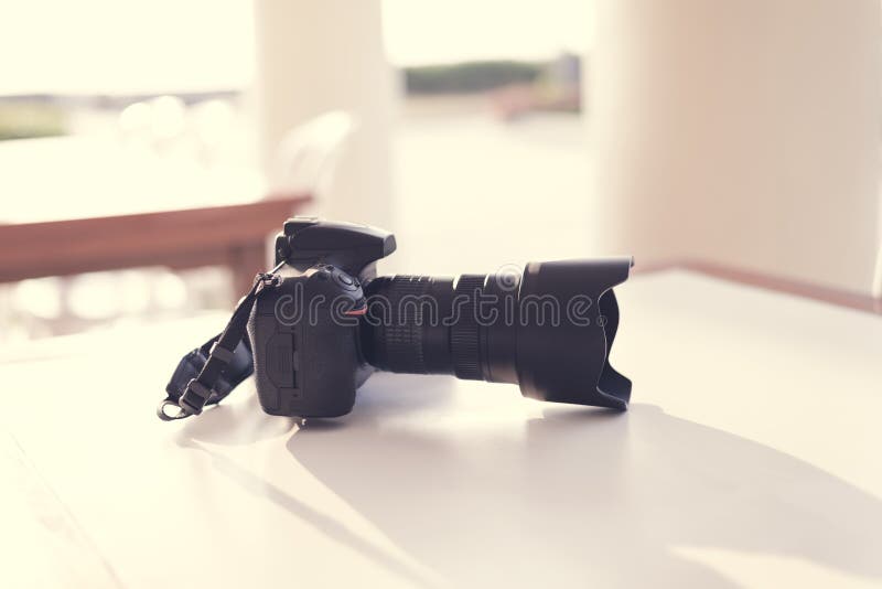 Dslr Camera on the Table with Morning Sun Light Stock Photo - Image of ...