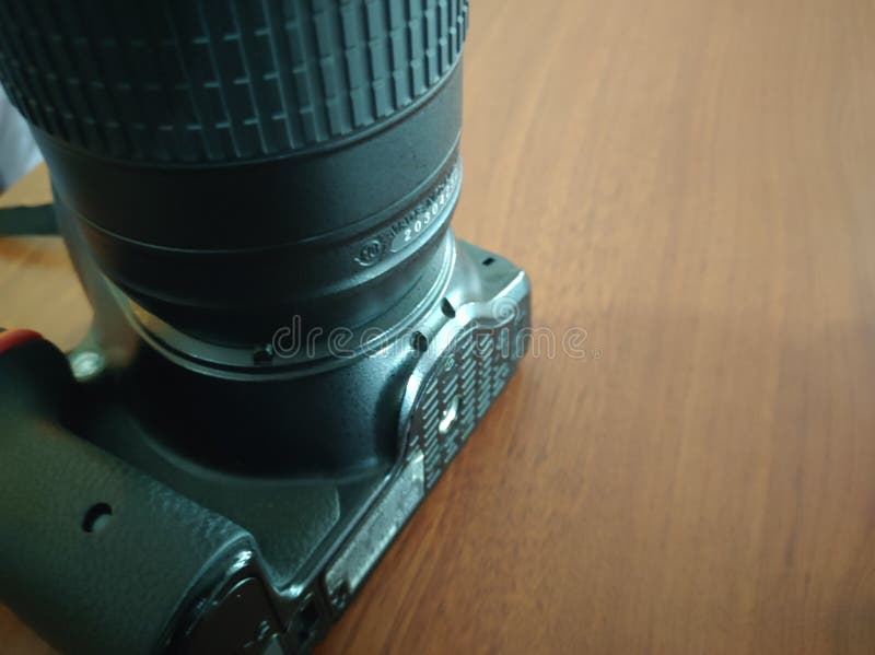 Dslr camera with tele lens stock image. Image of green - 205531877