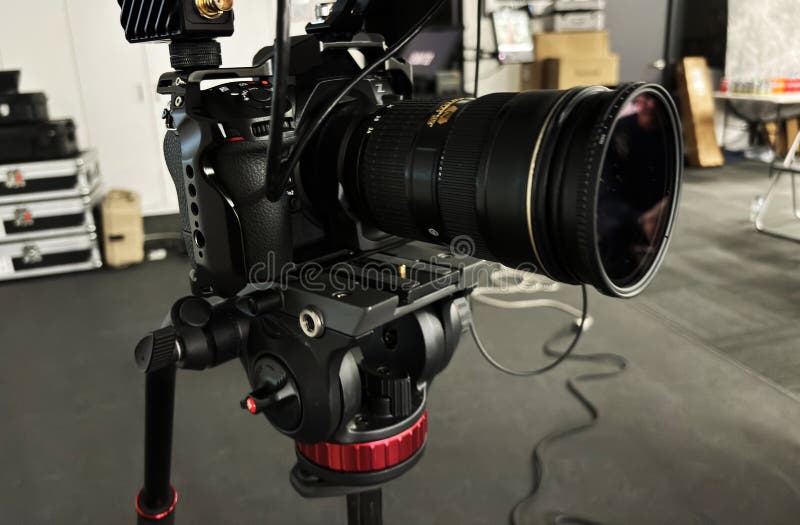 DSLR Camera with Tripod Mount and Cables at Presentation Evening Stock ...