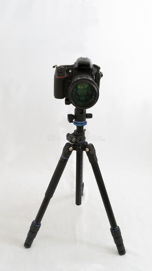 Dslr camera on tripod. stock image. Image of tripod - 196135615