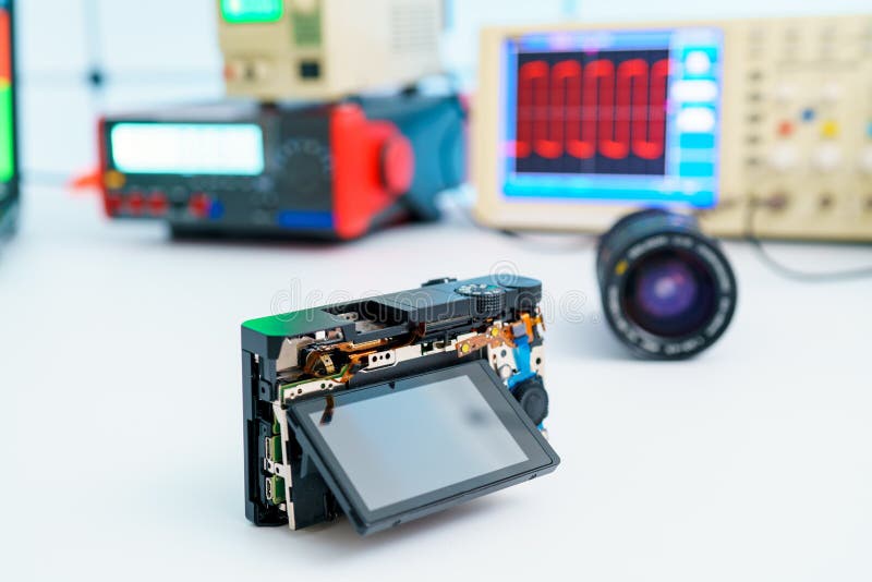 DSLR Photo Camera in the Service Center for Repair Stock Photo - Image ...