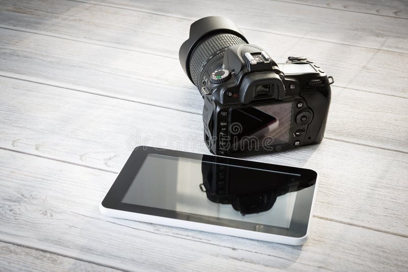 DSLR and tablet. stock photo. Image of hobby, objective - 55976118