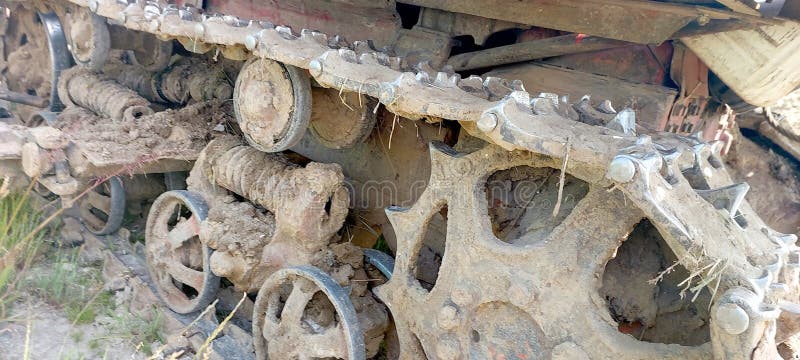 DT Tracked Tractor Navigating through Muddy Terrain during Springtime ...