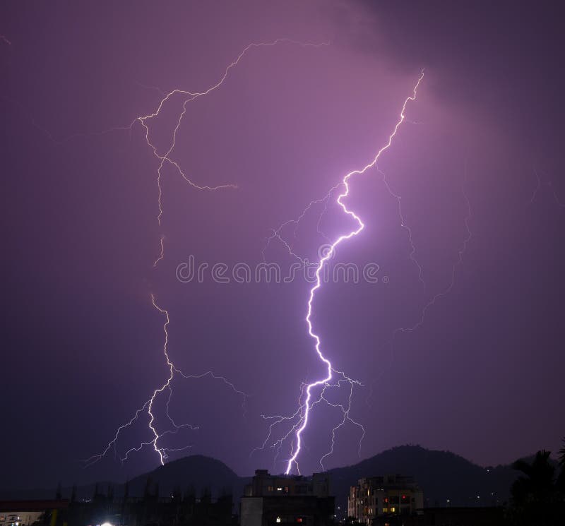 Dual Lightning Strike Over a Mountain . Stock Image - Image of strike ...