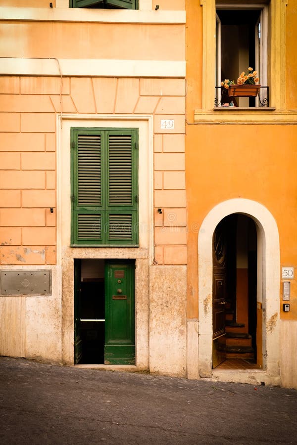Two Old Homes and Doors in Yellow in Italy Editorial Stock Photo ...