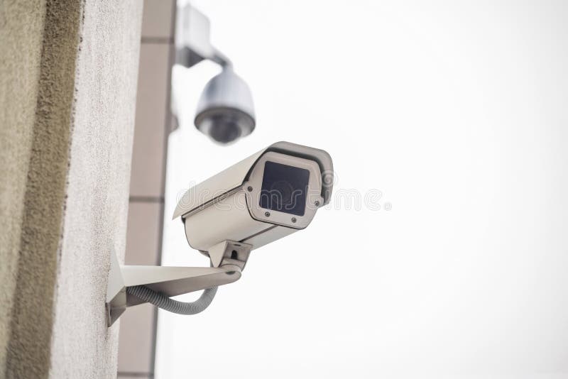 Dual Security Cameras on Wall Surveillance Setup Stock Image - Image of ...
