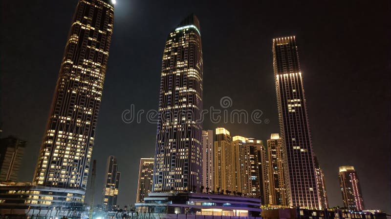 Dubai building at night editorial stock image. Image of night - 261526459