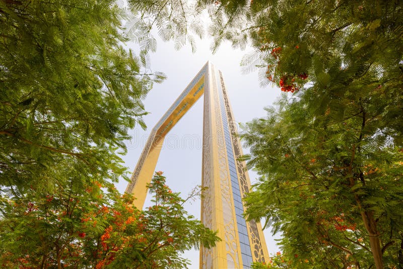 The Dubai Frame Surrounded by Foliage As Seen from Below in a Sunny ...