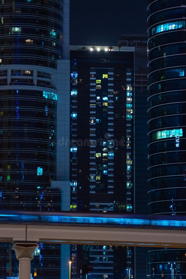 Dubai Metro Moving in Front of Skyscrapers with Motion Blur Editorial ...