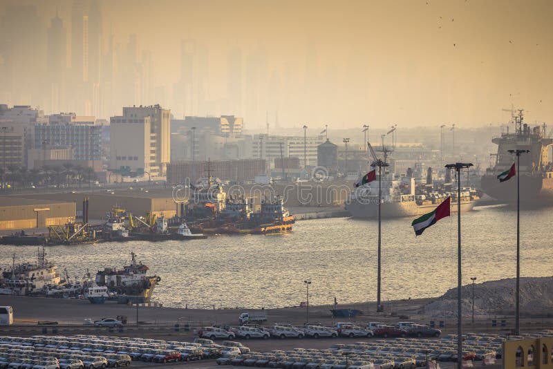 Dubai port view at sunset editorial stock image. Image of ship - 136524234