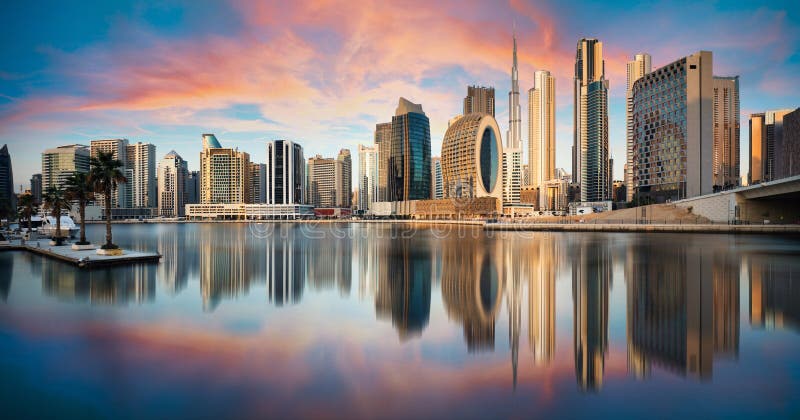 Dubai Skyline with Reflection at Dramatic Sunset, UAE Stock Photo ...