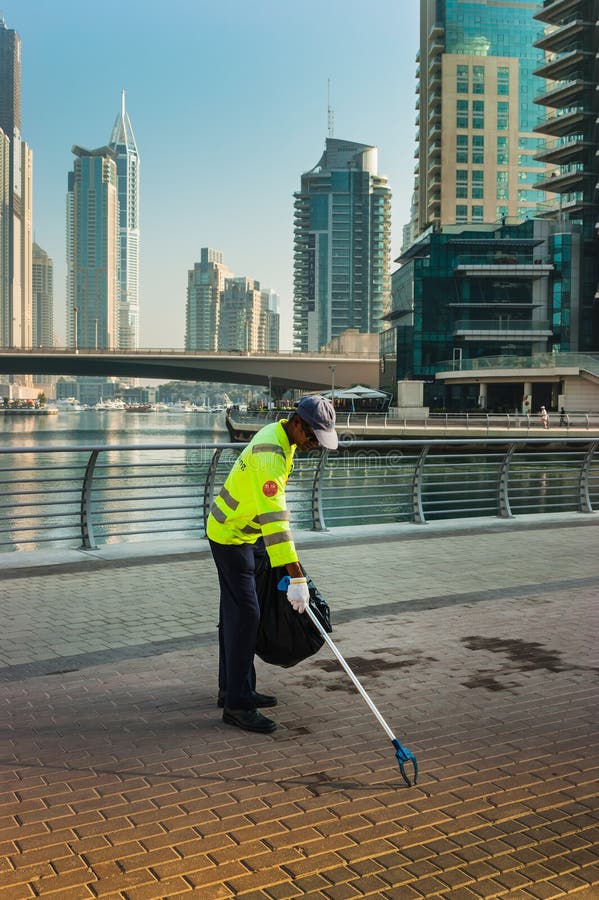 Dubai street cleaner editorial photo. Image of male, person - 61546596