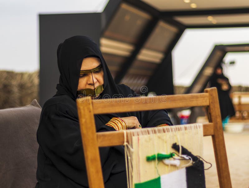 Dubai, UAE - 12.10.2022 - an Arab Woman Working on Traditional Craft ...