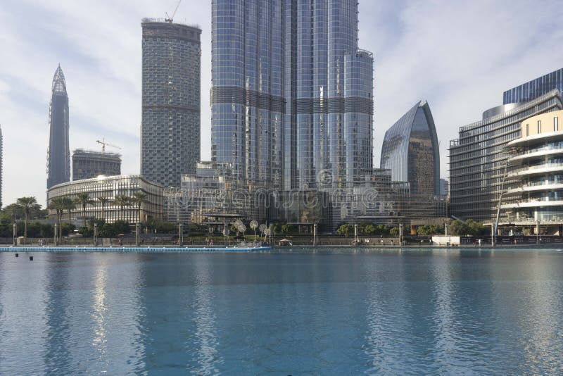 External Artificial Pool of Dubai Mall with Burj Khalifa Building in ...