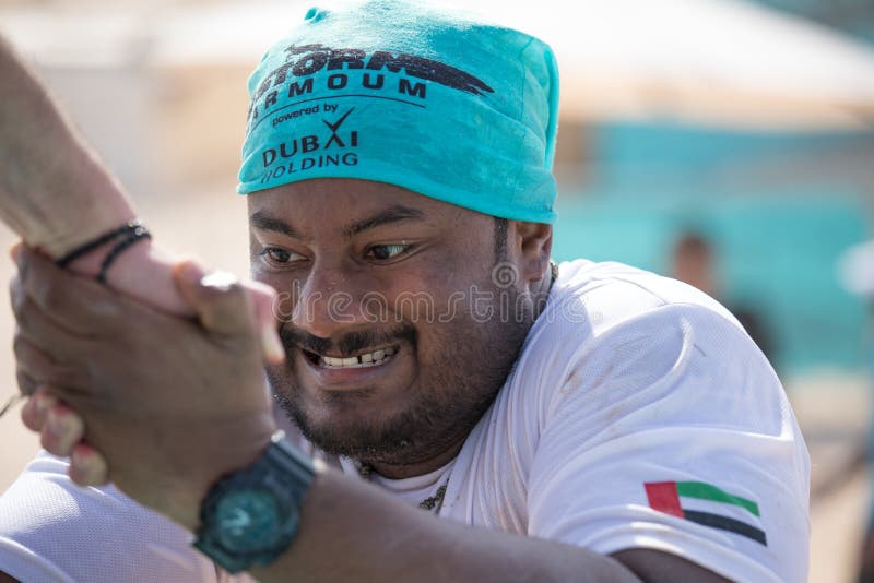 Dubai, UAE - Feb 10, 2017: Participant Competing on an Obstacle Course ...