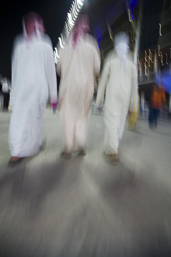 Dubai UAE Small Group of Traditionally Dressed Muslim Men Roaming ...
