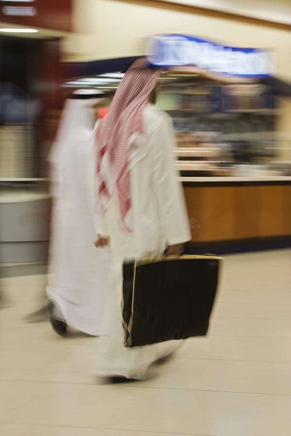 Dubai UAE Two Men Traditionally Dressed in Dishdashs and Gutras White ...